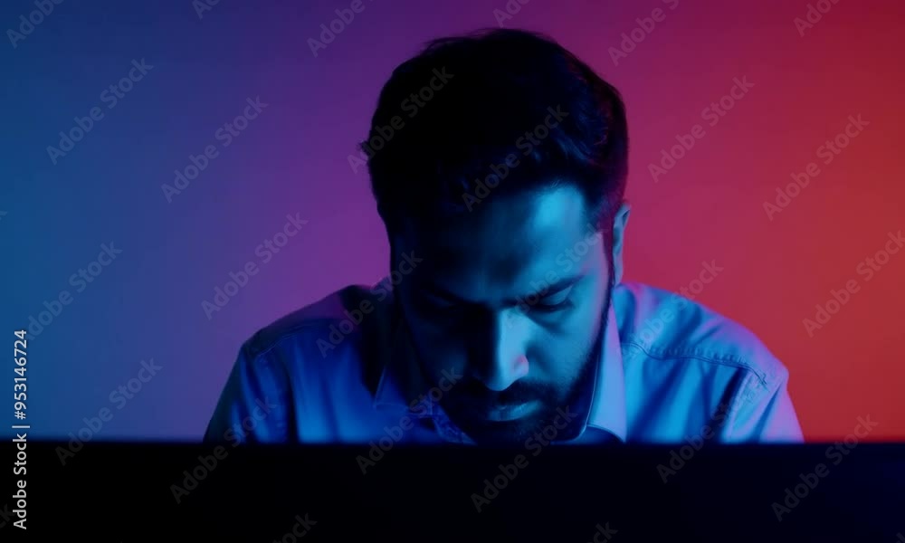 a gamer or WFH worker is frustrated and stressed out in front of his ...