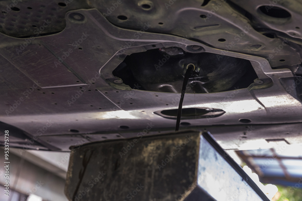 Drain the old oil from the engine through the drain plug. Changing the ...