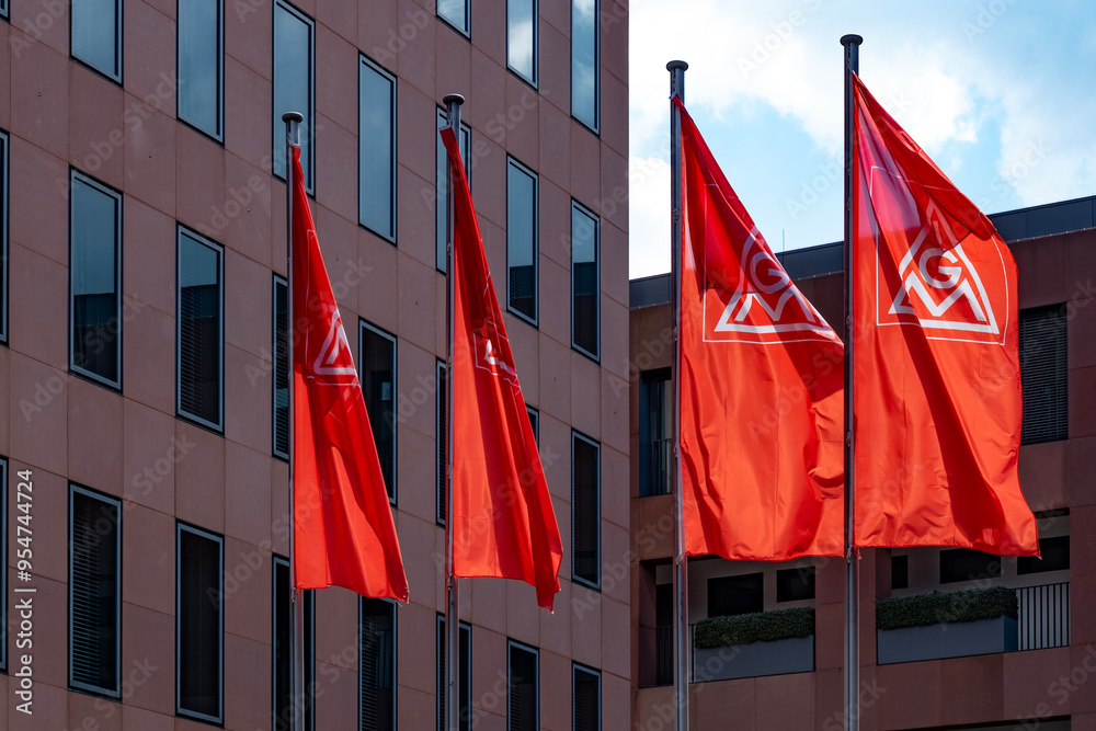 Red IGM flags IG Metall logo, German dominant metalworkers union on ...