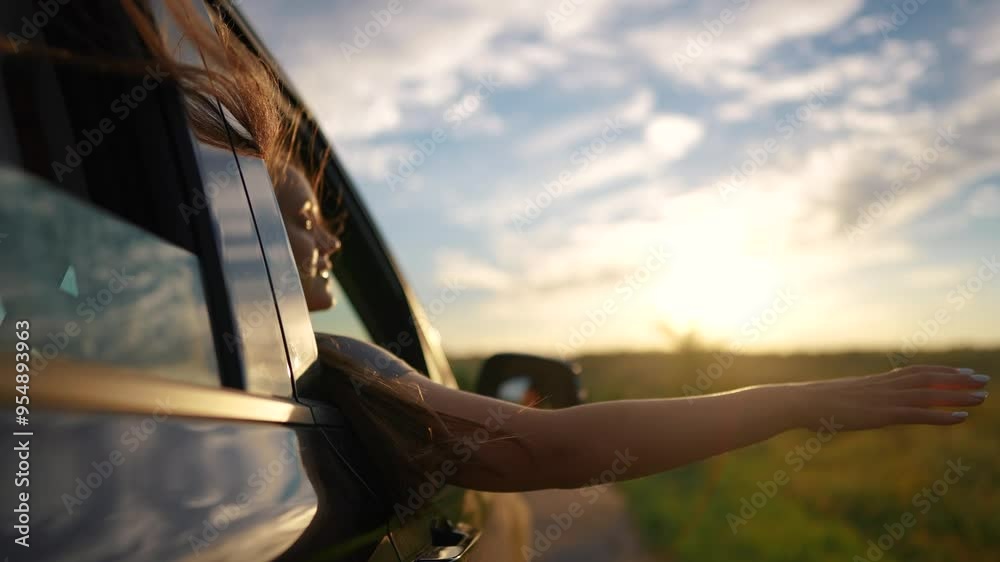 Travel. Girl hand from the car goes backdrop of the sunset. Roadtrip ...