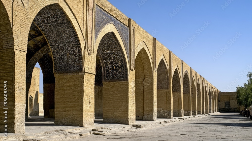 The grand arches of the Abbasid Palace in Baghdad, with intricate stone ...