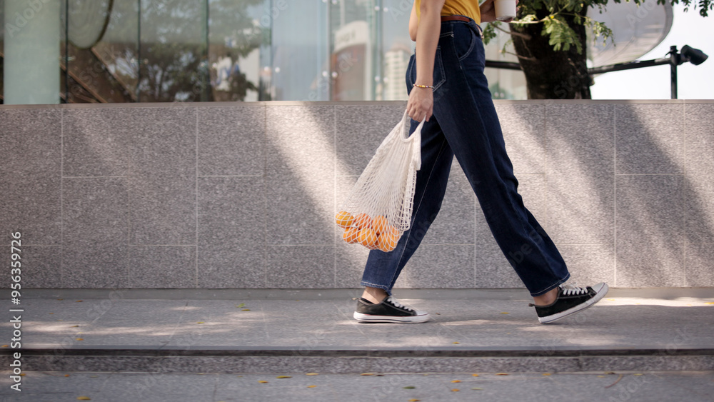 Go green Gen Z asia young woman relax step walk in city life carrying ...