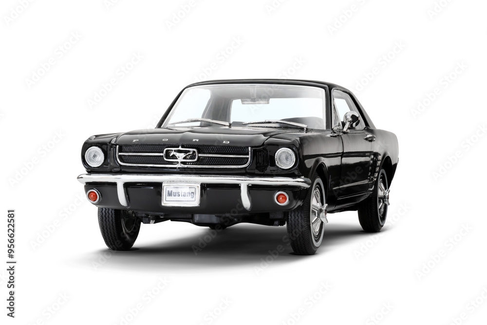 Front and slight left side view of a black Ford Mustang 260 model toy ...