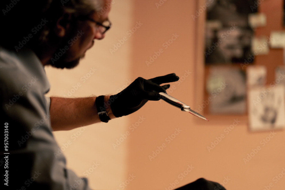 close-up detective's office middle-aged investigator in shirt and tie ...