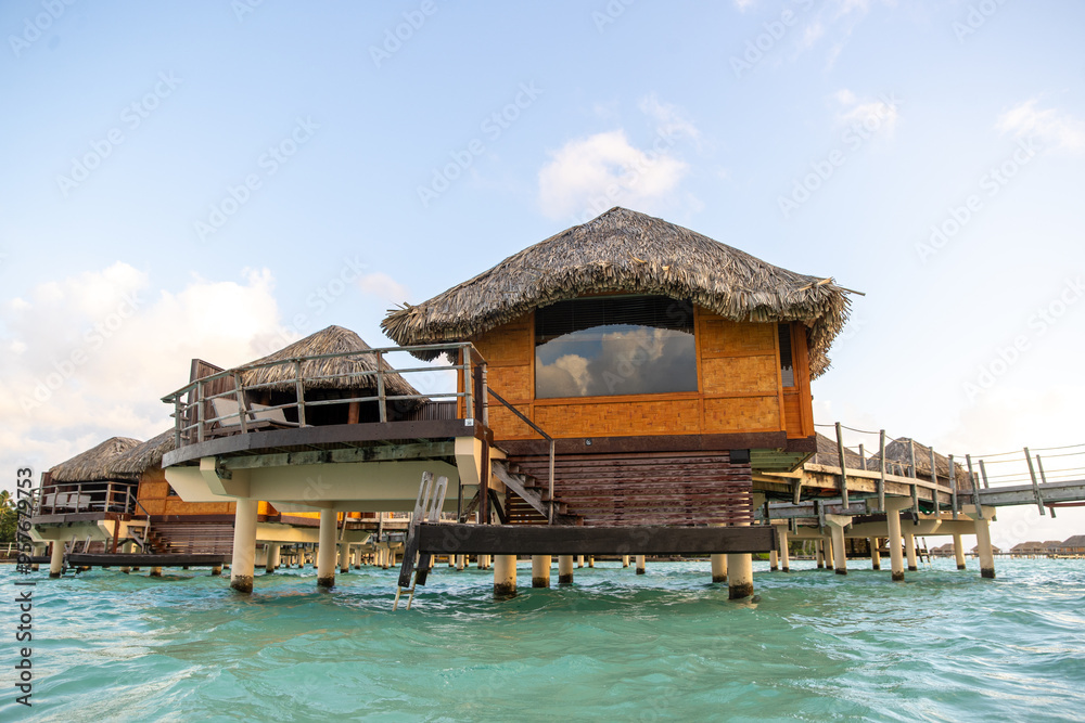 Overwater bungalow hut on a tropical island resort. The popular tourist ...