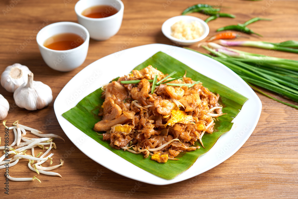 Penang Char Kway Teow or fried noodle with prawns, popular cuisine in ...