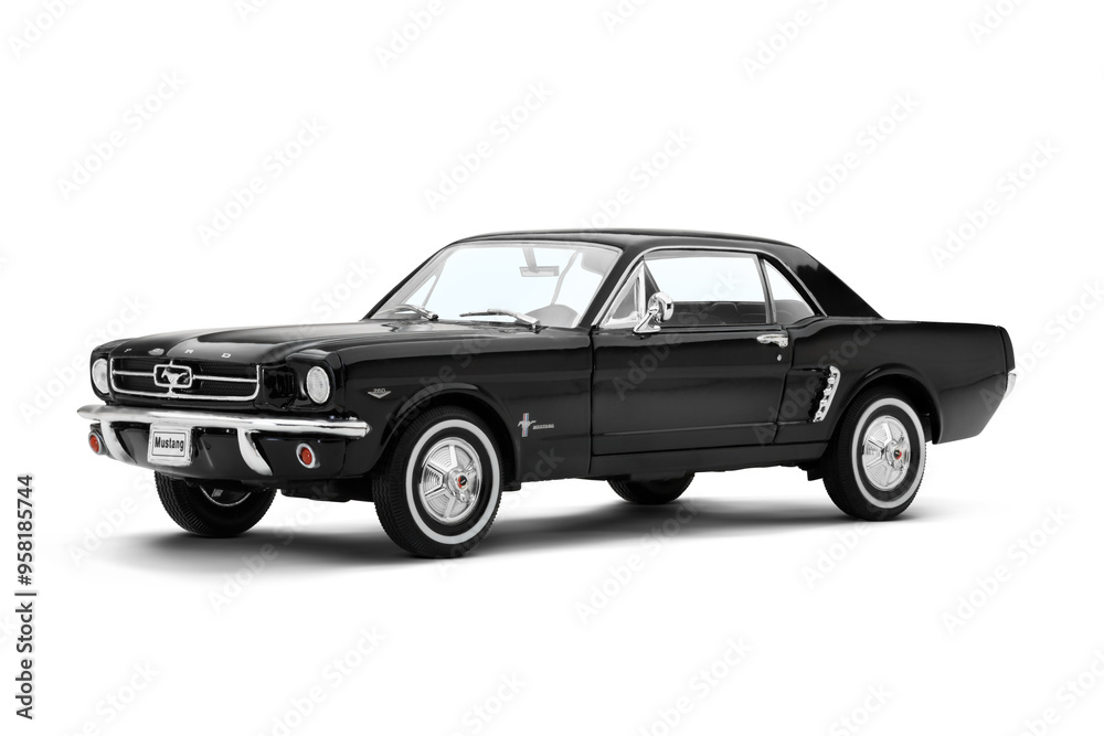 Front and slight left side view of a black Ford Mustang 260 model toy ...
