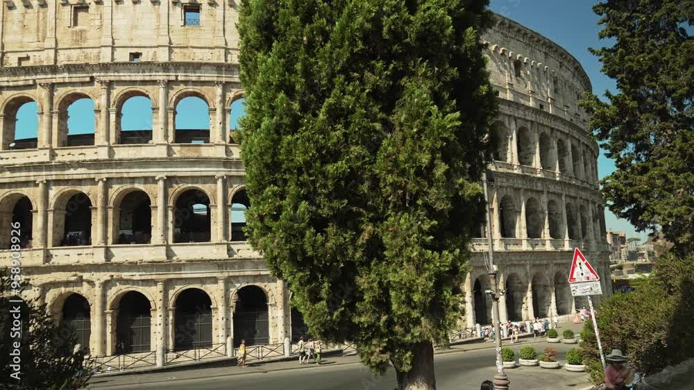 Crowd of tourists strolls near the Roman Coliseum or Flavian ...