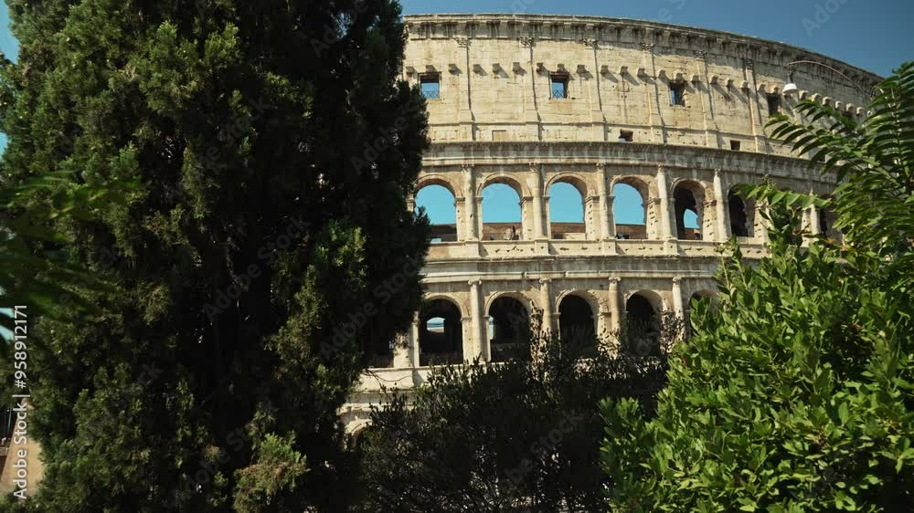 Crowd of tourists strolls near the Roman Coliseum or Flavian ...