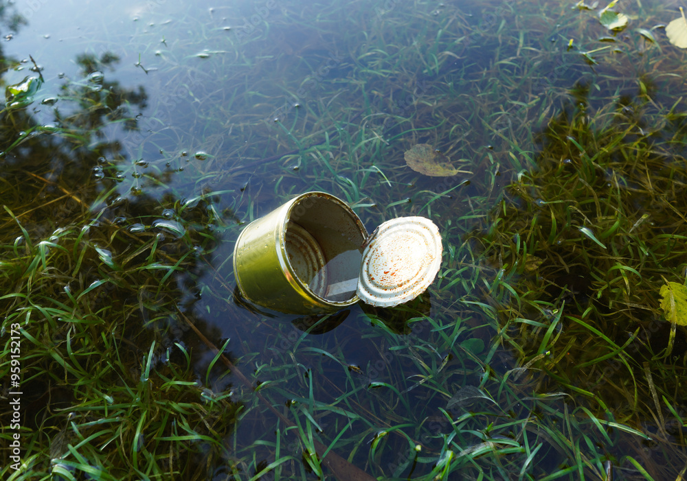 Aluminum food tin can Waste. Ocean pollution, marine debris. Tin can ...