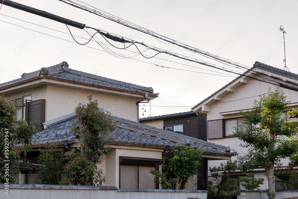 Traditional Japanese-style houses with tiled roofs in a quiet ...
