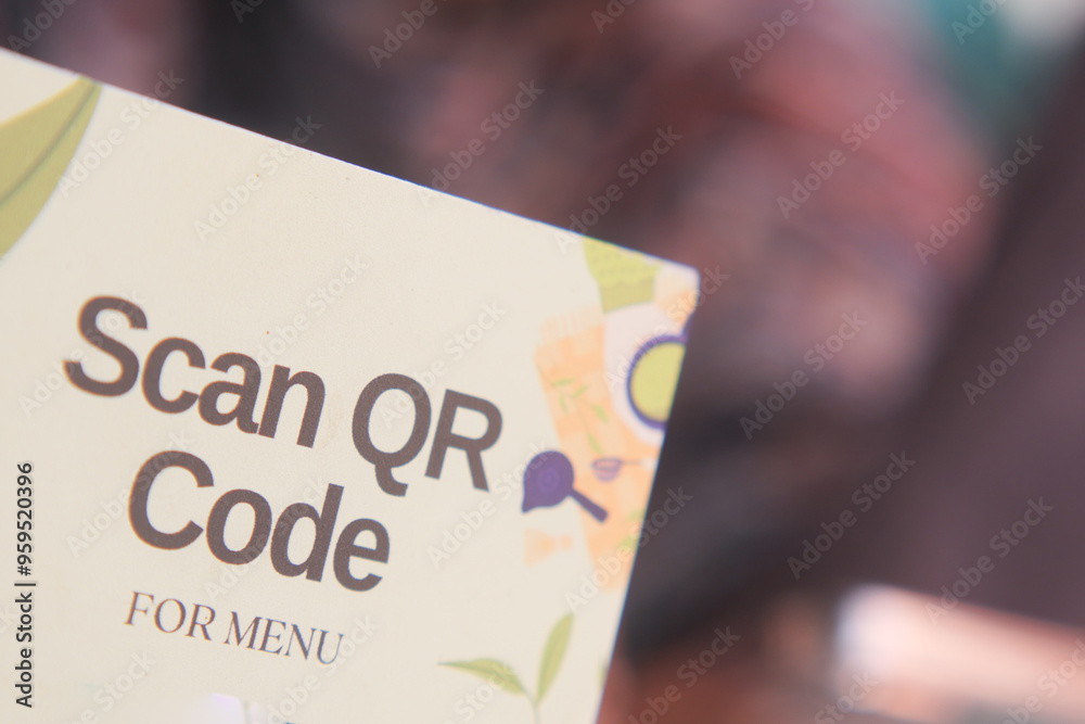 woman hand using the smart phone to scan the qr code to select food ...