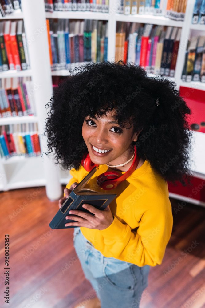 University, education woman in library reading a book. College ...