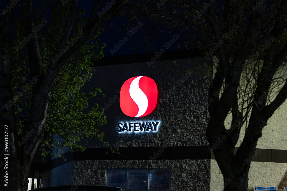 Beaverton, OR, USA - April 2, 2024 - Illuminated red white logo of ...