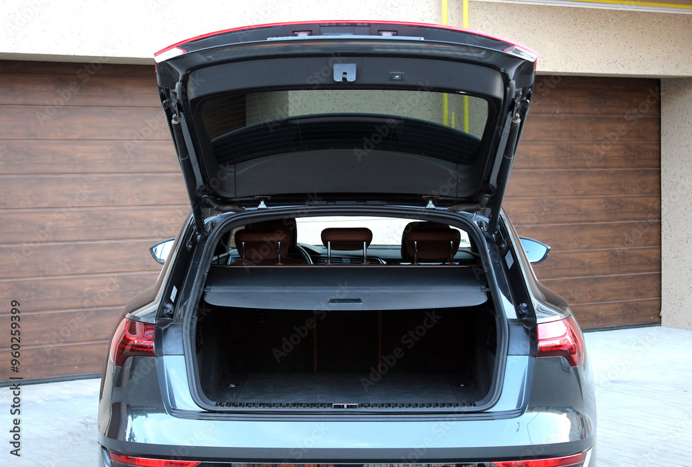 Open empty trunk of a grey SUV. Modern car with open empty trunk ...