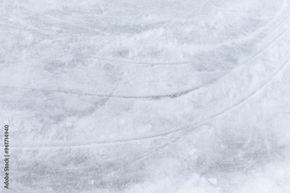 Ice background with marks from skating and hockey, blue texture of rink ...