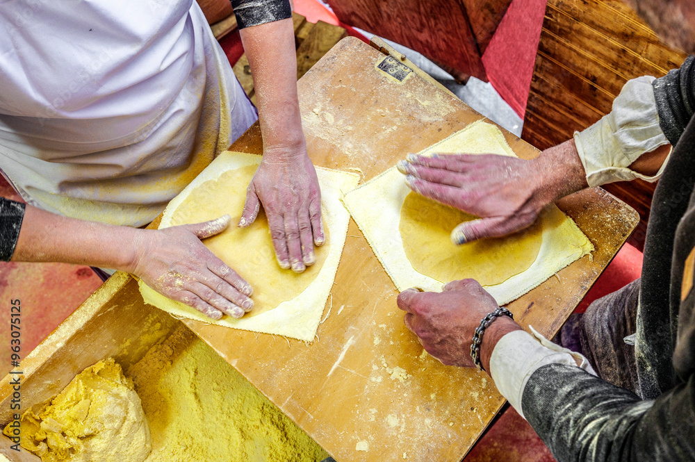 Basque farmers (Baserritarras) making Talos, a Basque tortilla stuffed ...