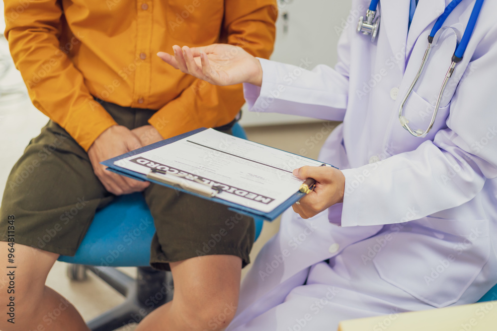 A female doctor performs a check for an enlarged prostate, evaluating ...