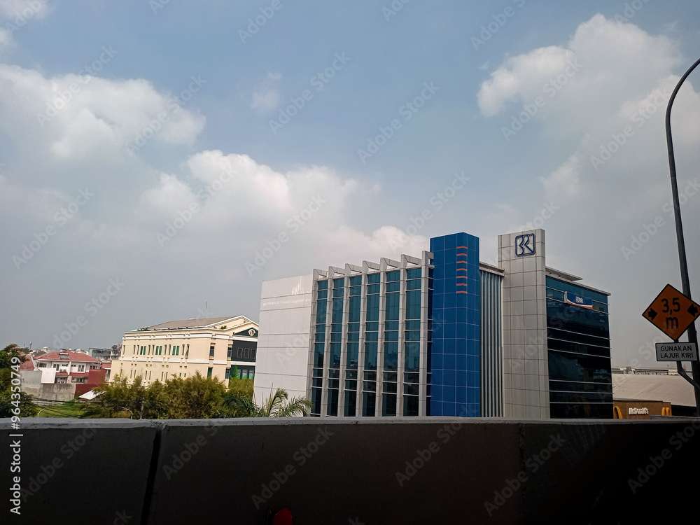 The building of Bank BRI (Bank Rakyat Indonesia) against the blue sky ...