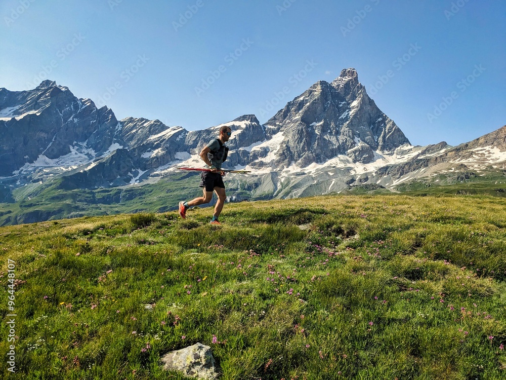 Trail run in front of Mount Cervino above Breuil-Cervinia in ...