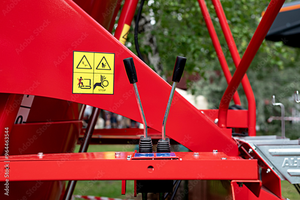 Blue hydraulic equipment close up. Levers for operating hydraulic ...