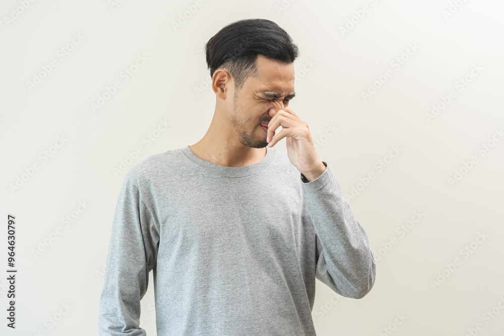 Bad smelling, deodorant asian young man hand squeeze, covering nose ...