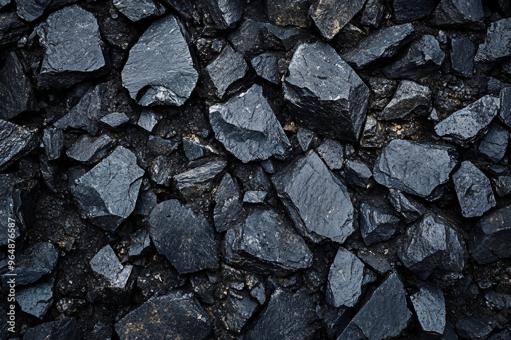 detailed view of jagged, rough black rocks, highlighting the rugged ...