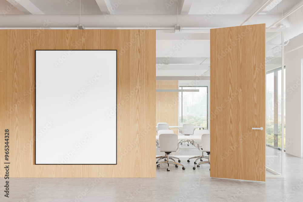 Interior of a modern office with an open door revealing a meeting room ...