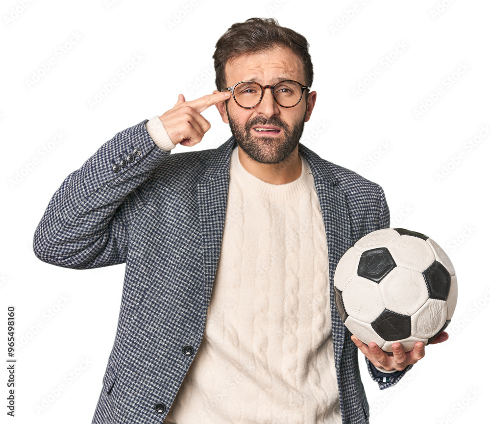 Hispanic male soccer coach in studio showing a disappointment gesture ...