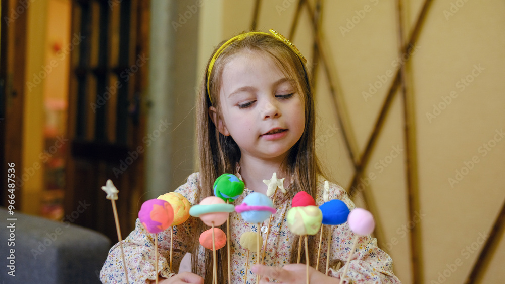 Solar system model toy planets made by kid from colorful molding clay ...