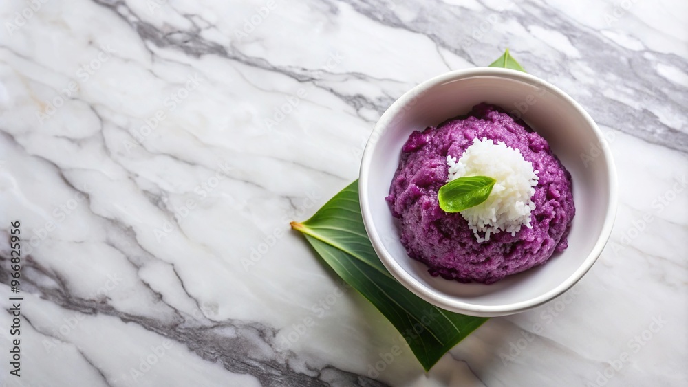 Purple sticky rice dessert with coconut on marble counter bird eye view ...