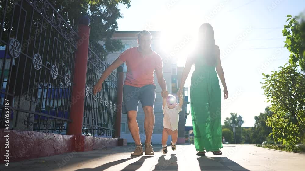 Family with baby running in the park. Kid happy people concept. Family ...