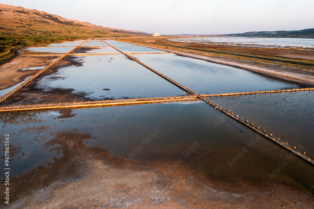 Shallow basins for sea salt production on Pag island in Croatia ...