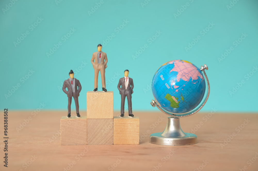 Poster With a world globe, a row of businessmen stood tall ...