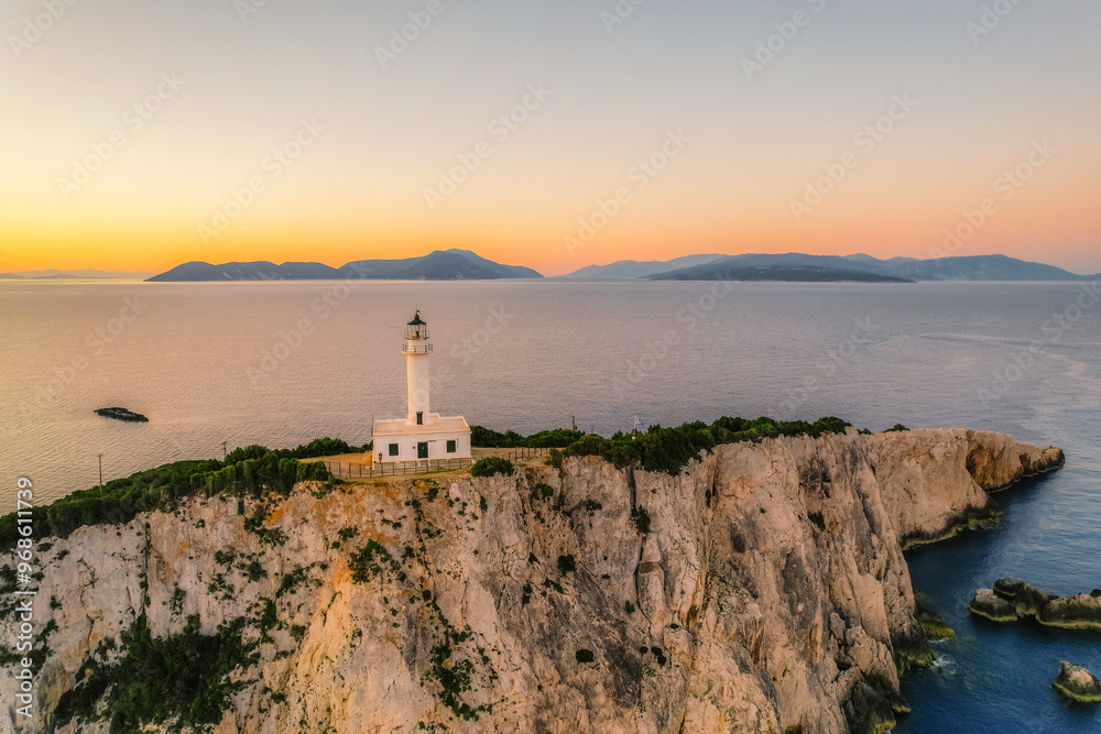 Lighthouse on the cliff. Seascape of Cape Lefkatas with old lighthouse ...
