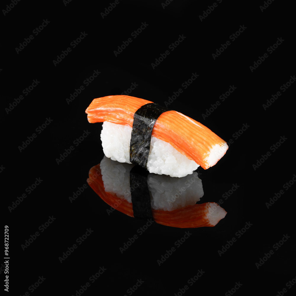 Delicious kani sushi on black background, with imitation crab, seasoned ...