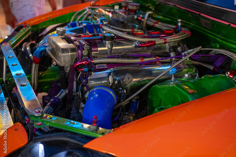 Orange Toyota Supra Mk4 equipped with a modified 2jz twin turbo engine ...
