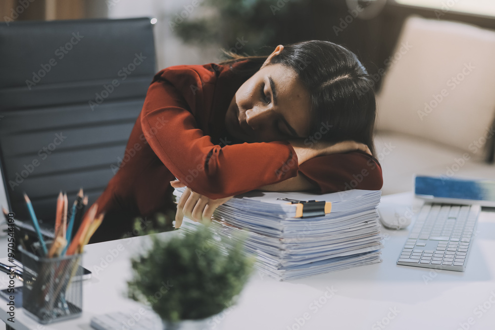 The business lady and the employee take a nap while working on the ...