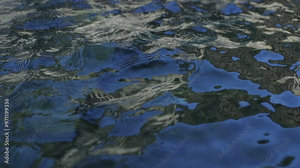 Natural background of blue water surface of sea or ocean with waves and ...