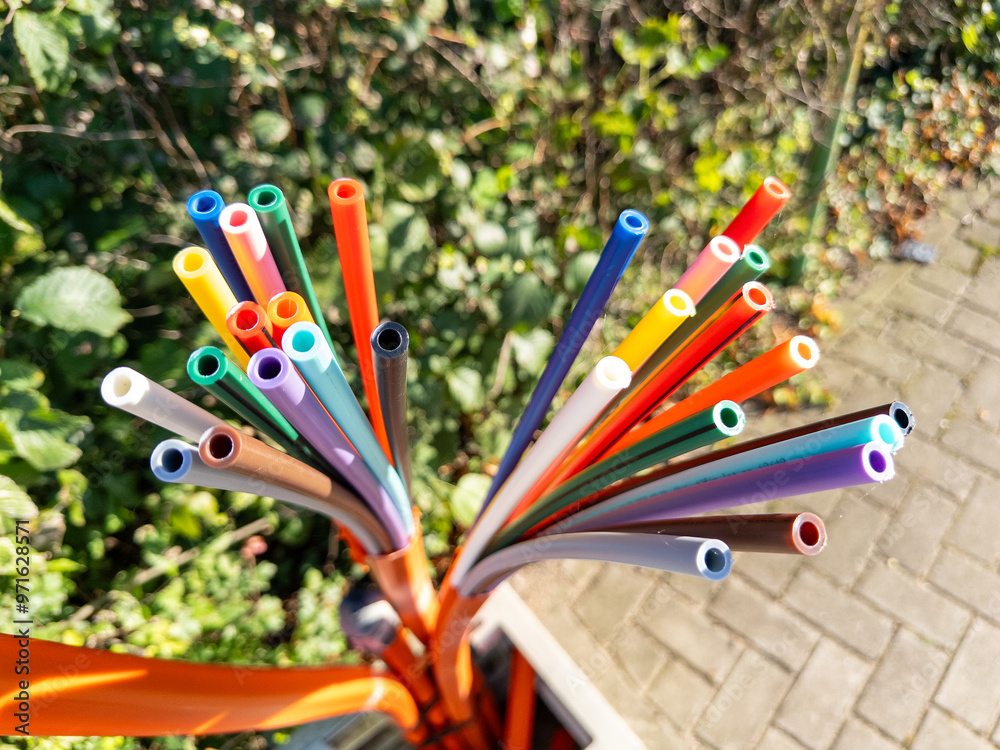 Poster Empty conduits and laid fibre optic cables in public spaces are ...