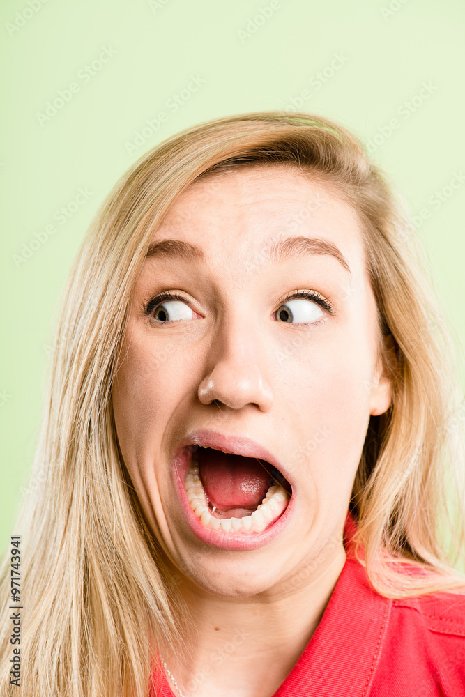 Woman, surprise and funny face with goofy expression for humor or ...