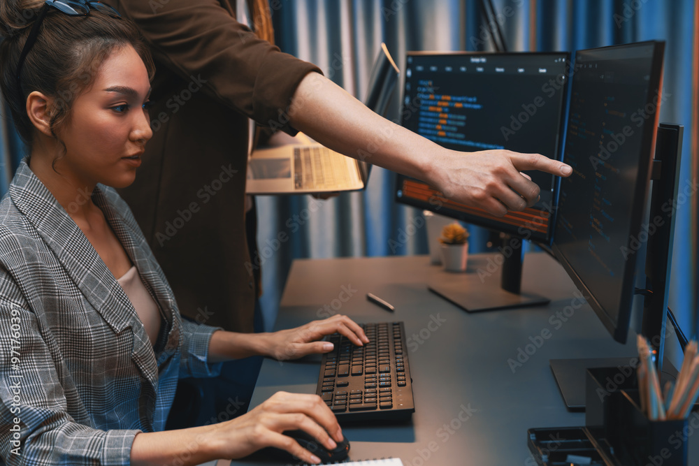 Serious of IT developers discussing intelligent website development coder system running data ...