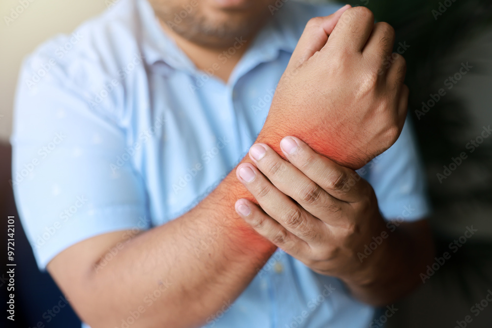 Young man injured his wrist and it was swollen and red. Causes of pain ...