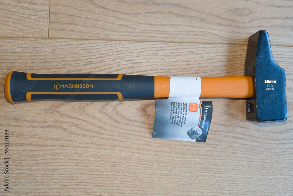 Magnusson tools mechanics hammer store chain kingfisher brand logo sign ...