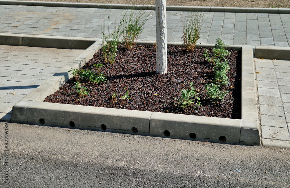drainage hidden on the edge of an asphalt road Drainage system hidden ...