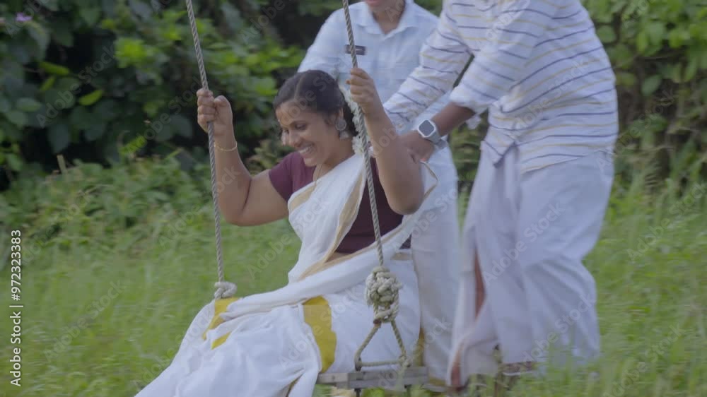 Onam traditional swing in Kerala called oonjal attam is traditional ...