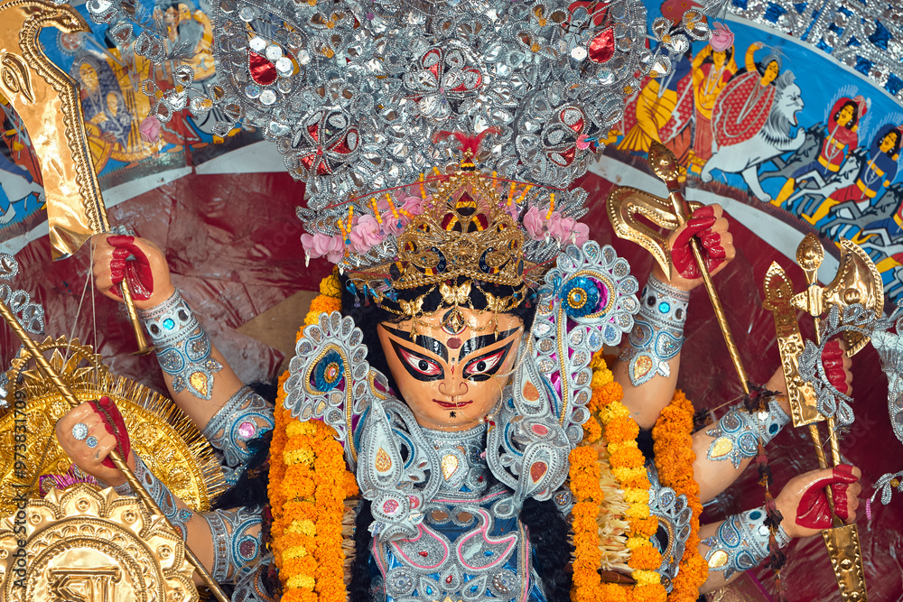 divine looking idol of Hindu Goddess Durga fighting demon Mahishasura ...