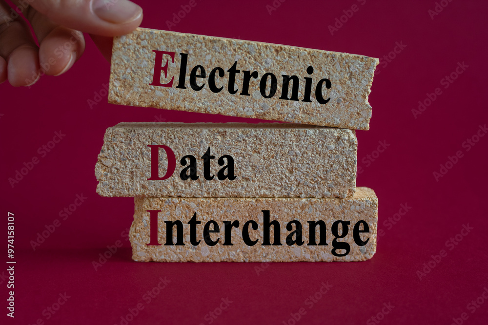 Concept words EDI electronic data interchange on brick blocks ...