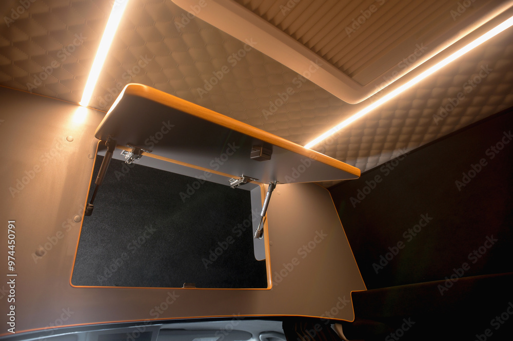 Comfortable interior of a passenger bus with soft seats. The design is ...