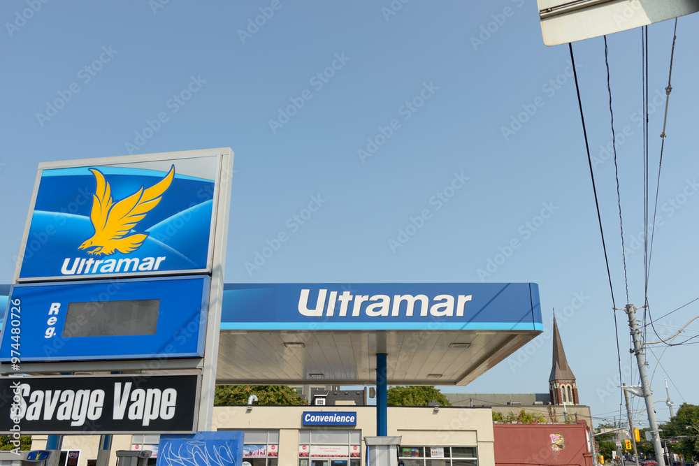 exterior pylon signs and station pavilion of Ultramar, Gas Station ...